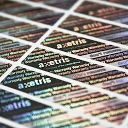 Holographic security seal for Axetris - advast suisse AG